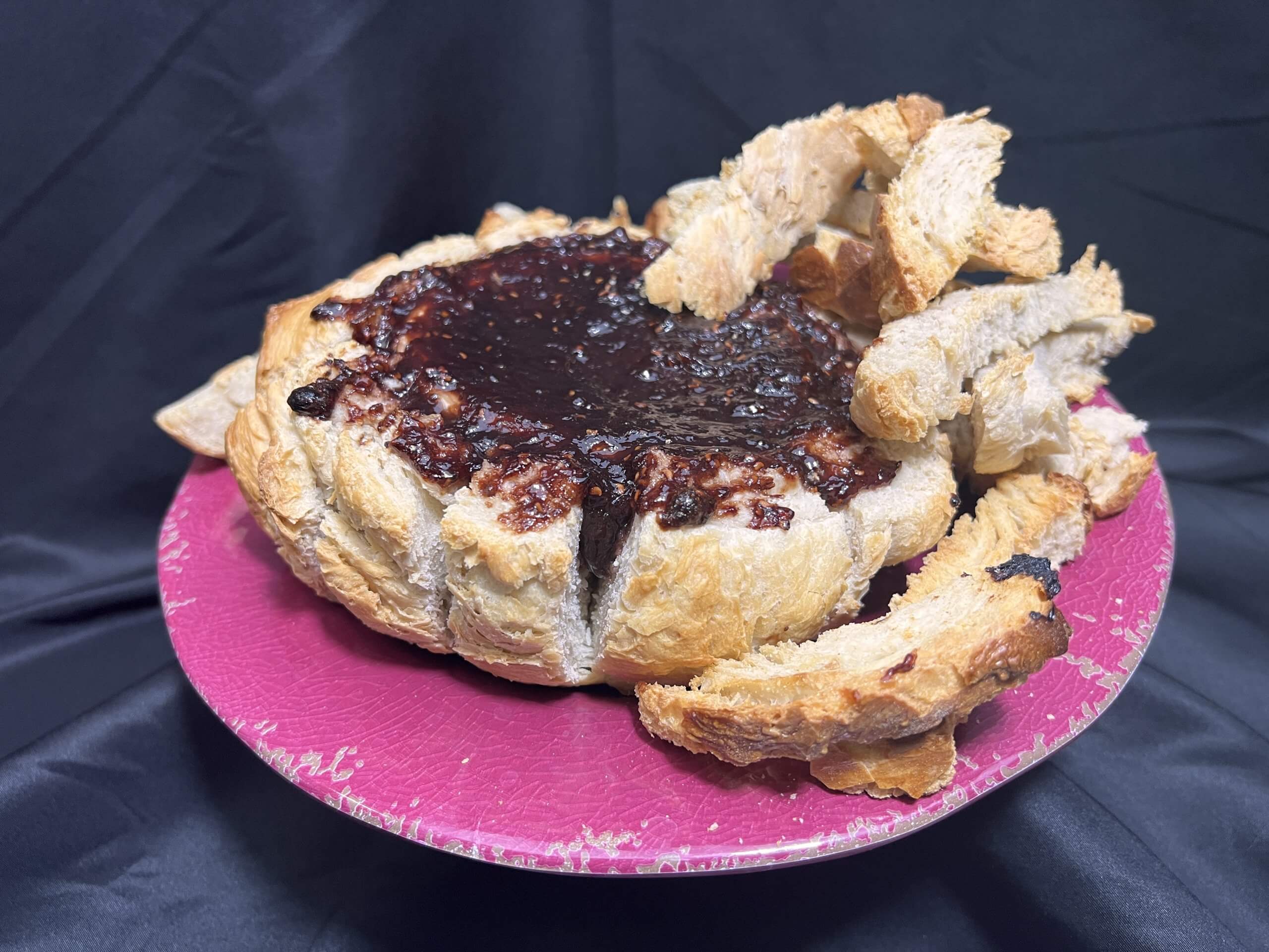 Indulge in a Raspberry Rose Baked Brie Loaf for a Romantic Twist